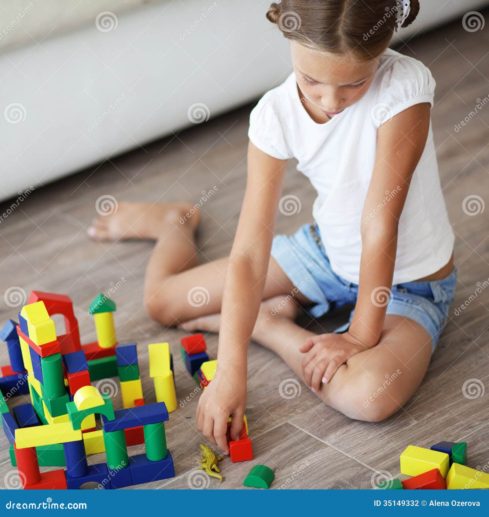 Child playing with blocks stock photo. Image of diligent - 35149332