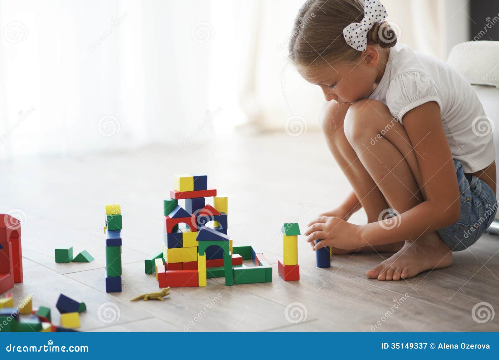 Child playing with blocks stock image. Image of assiduous - 35149337