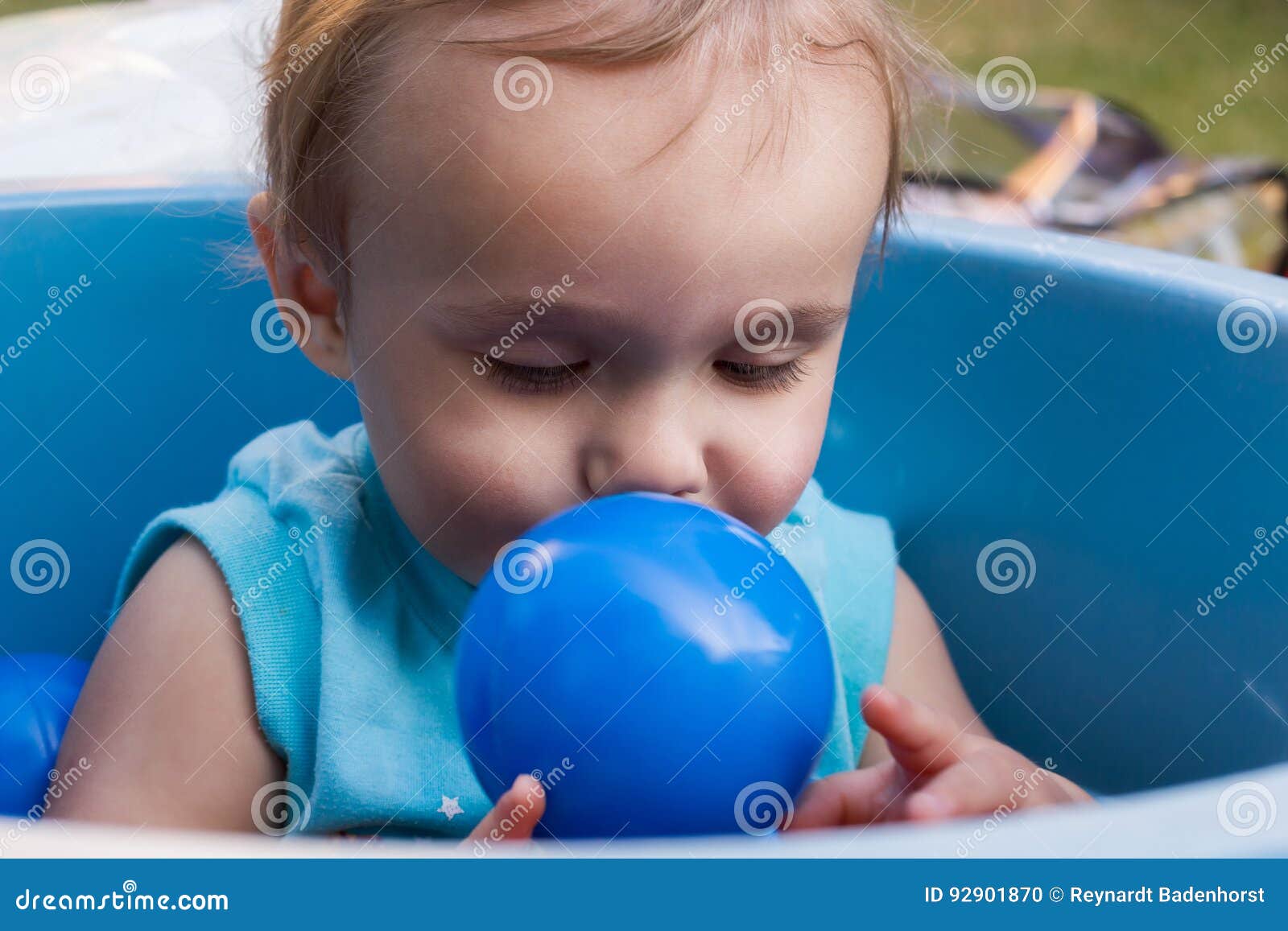 Child Playing with Blue Ball Stock Photo - Image of mouth, play: 92901870