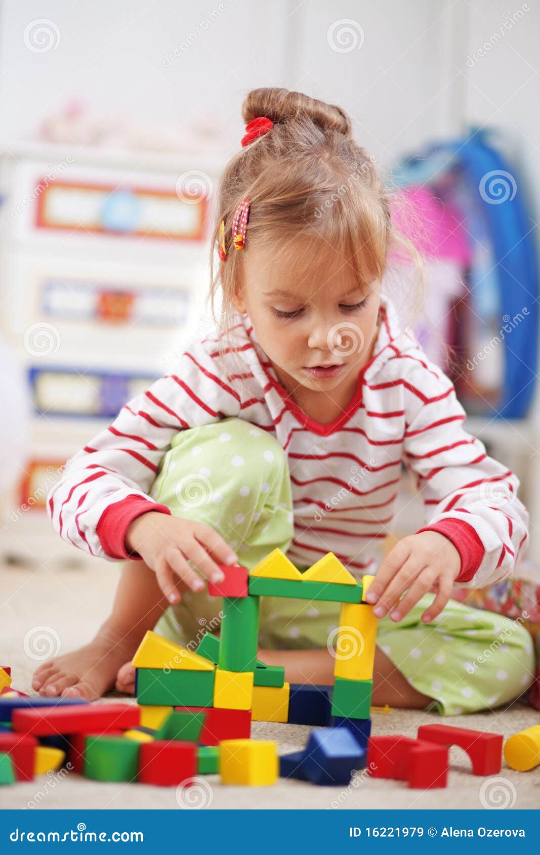 Child playing with bricks stock image. Image of creative - 16221979