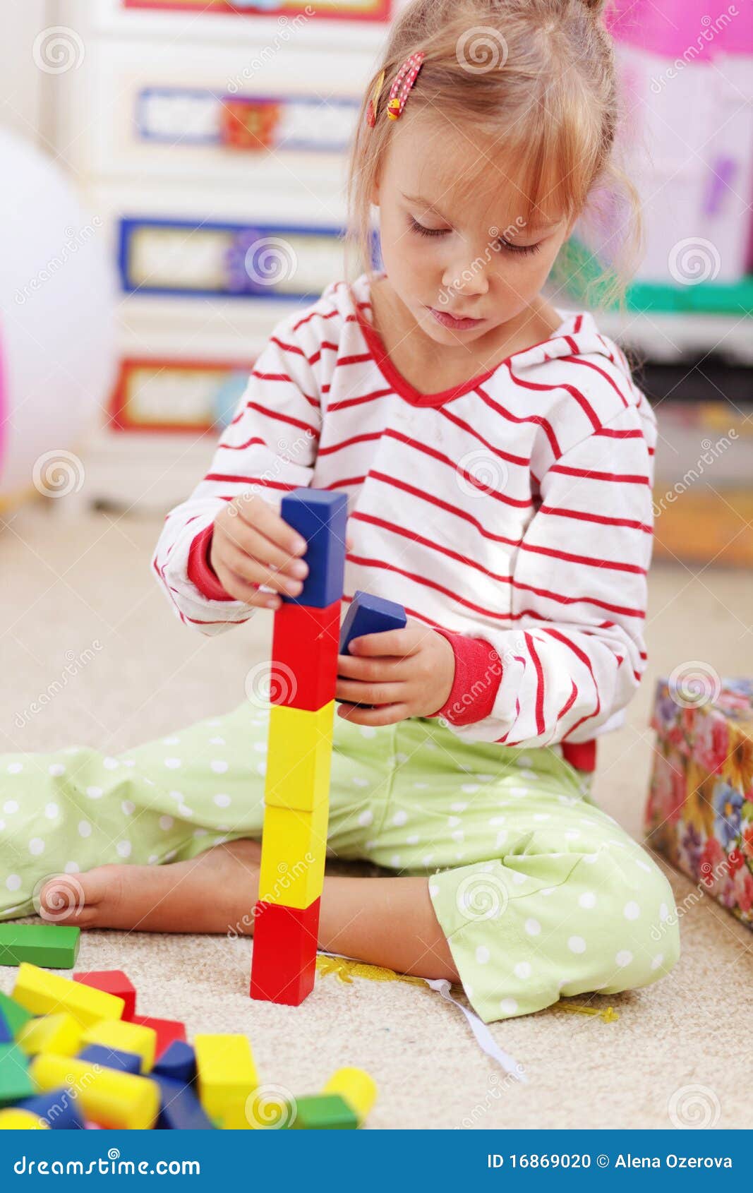 Child playing with bricks stock photo. Image of construction - 16869020