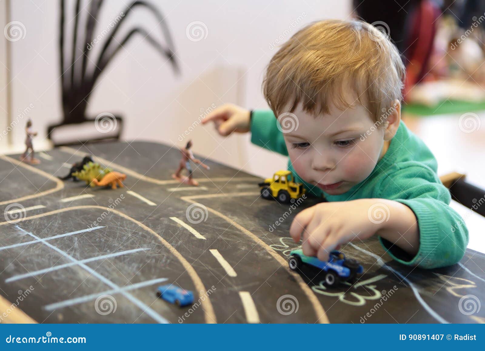 Child playing with car stock image. Image of development - 90891407