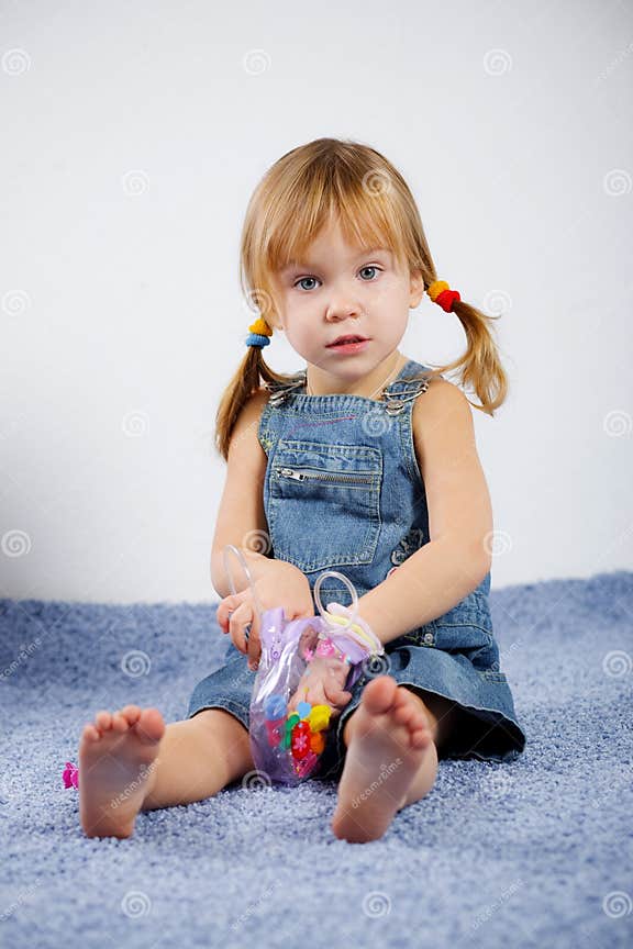 Child playing on carpet stock photo. Image of cute, floor - 10436134