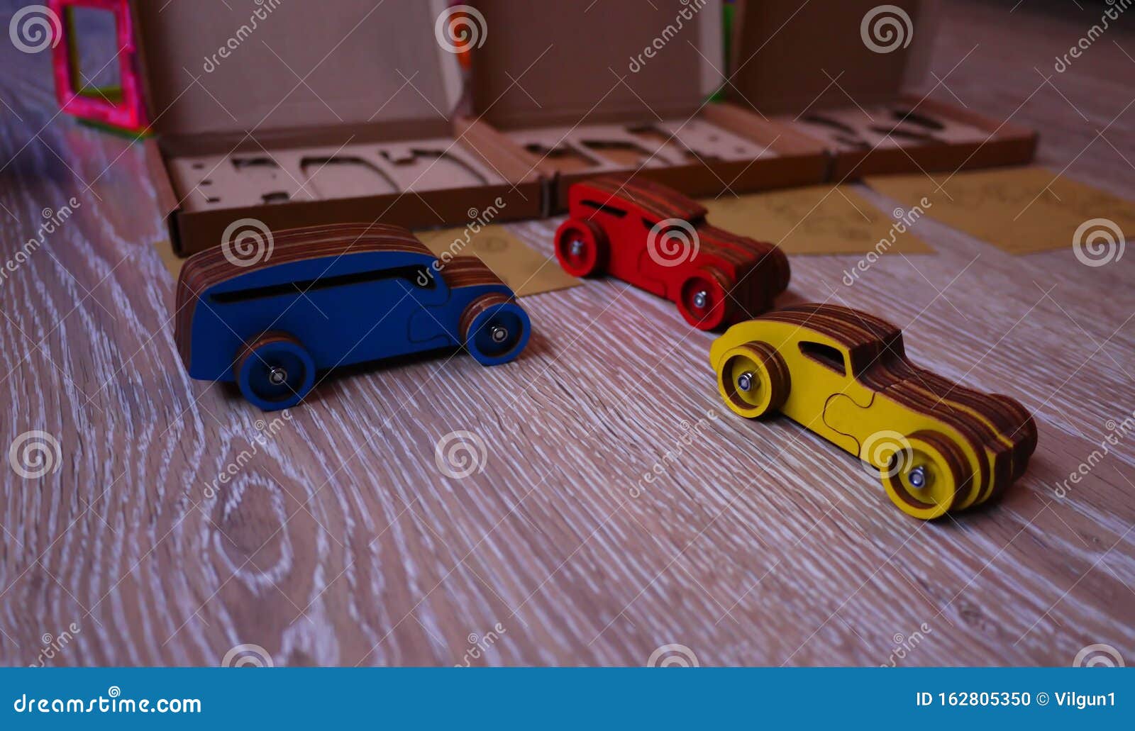 A child playing with cars stock photo. Image of driver - 162805350