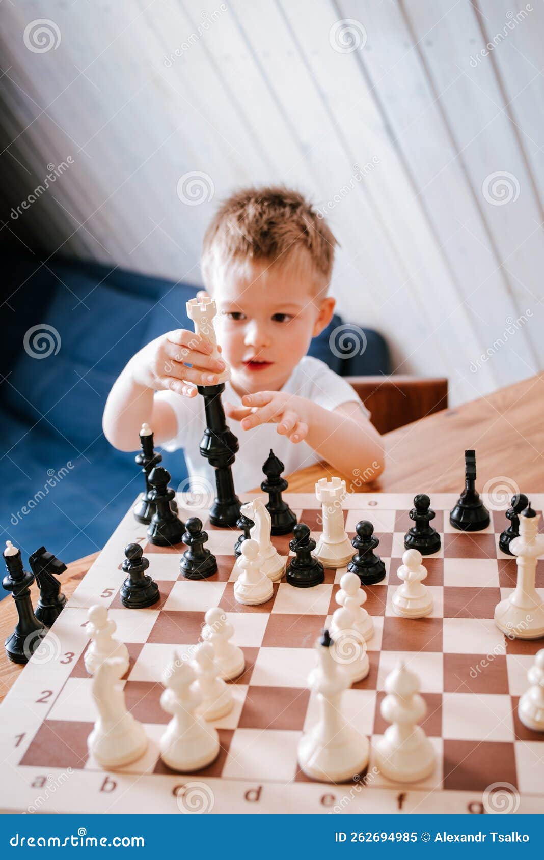 Child Playing Chess at Home at the Table Stock Image - Image of leisure ...