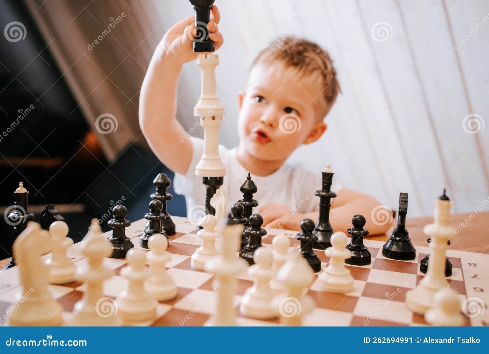 Child Playing Chess at Home at the Table Stock Image - Image of game ...