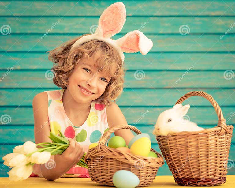 Child Playing with Easter Bunny Stock Image - Image of colorful, happy ...