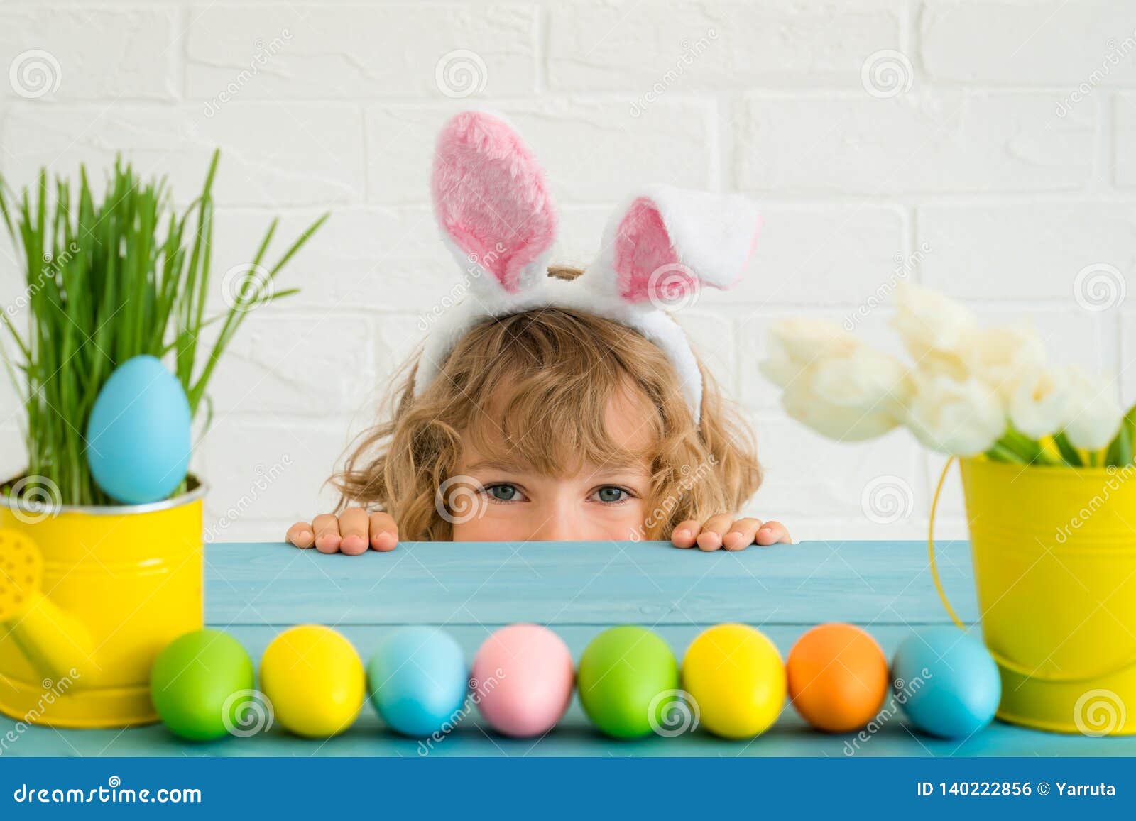 Child Playing with Easter Bunny Stock Photo - Image of background ...