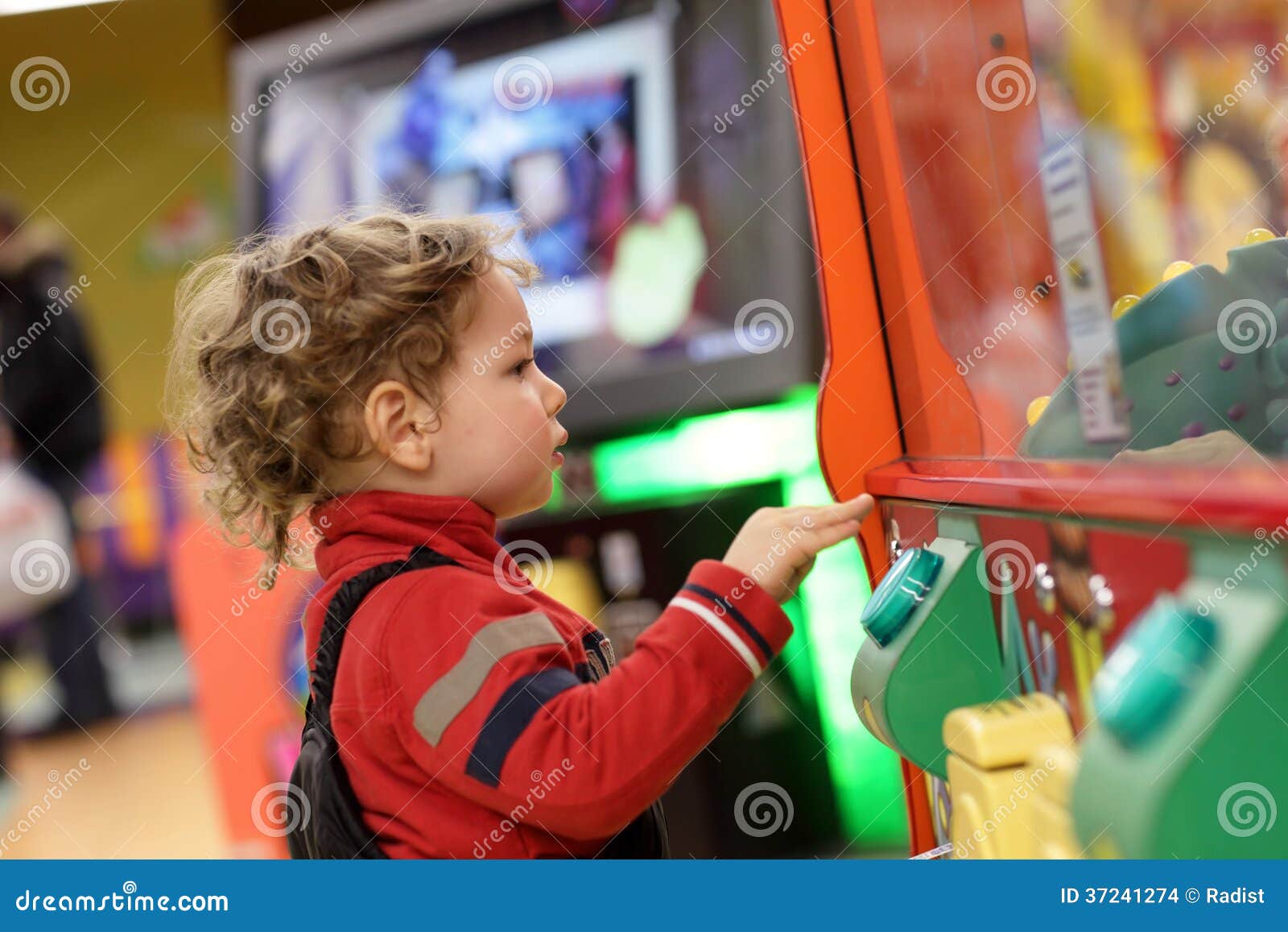 Child Playing on Game Machine Stock Photo - Image of game, child: 37241274