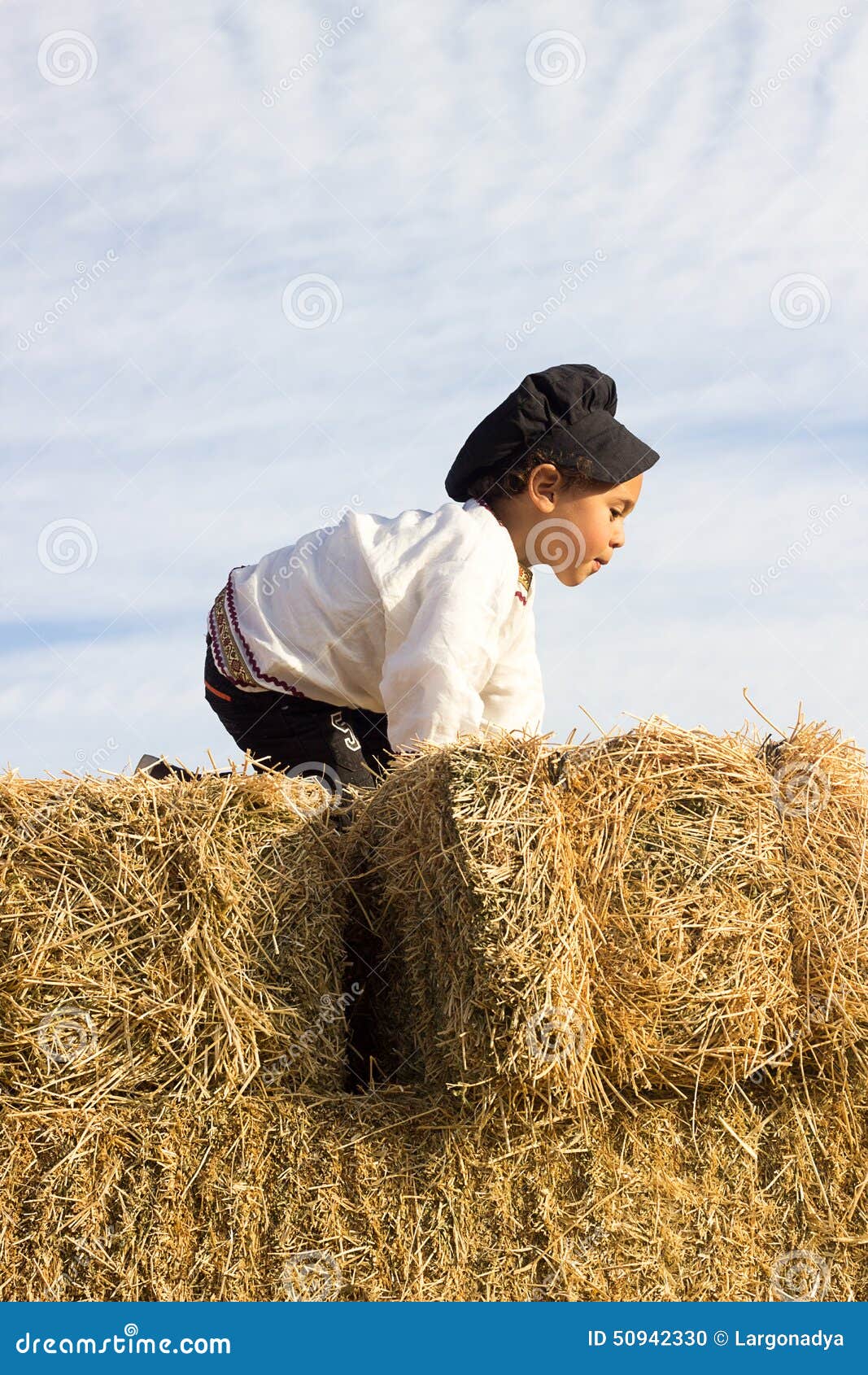 Child Playing in a Haystack. Stock Photo - Image of grass, beautiful ...