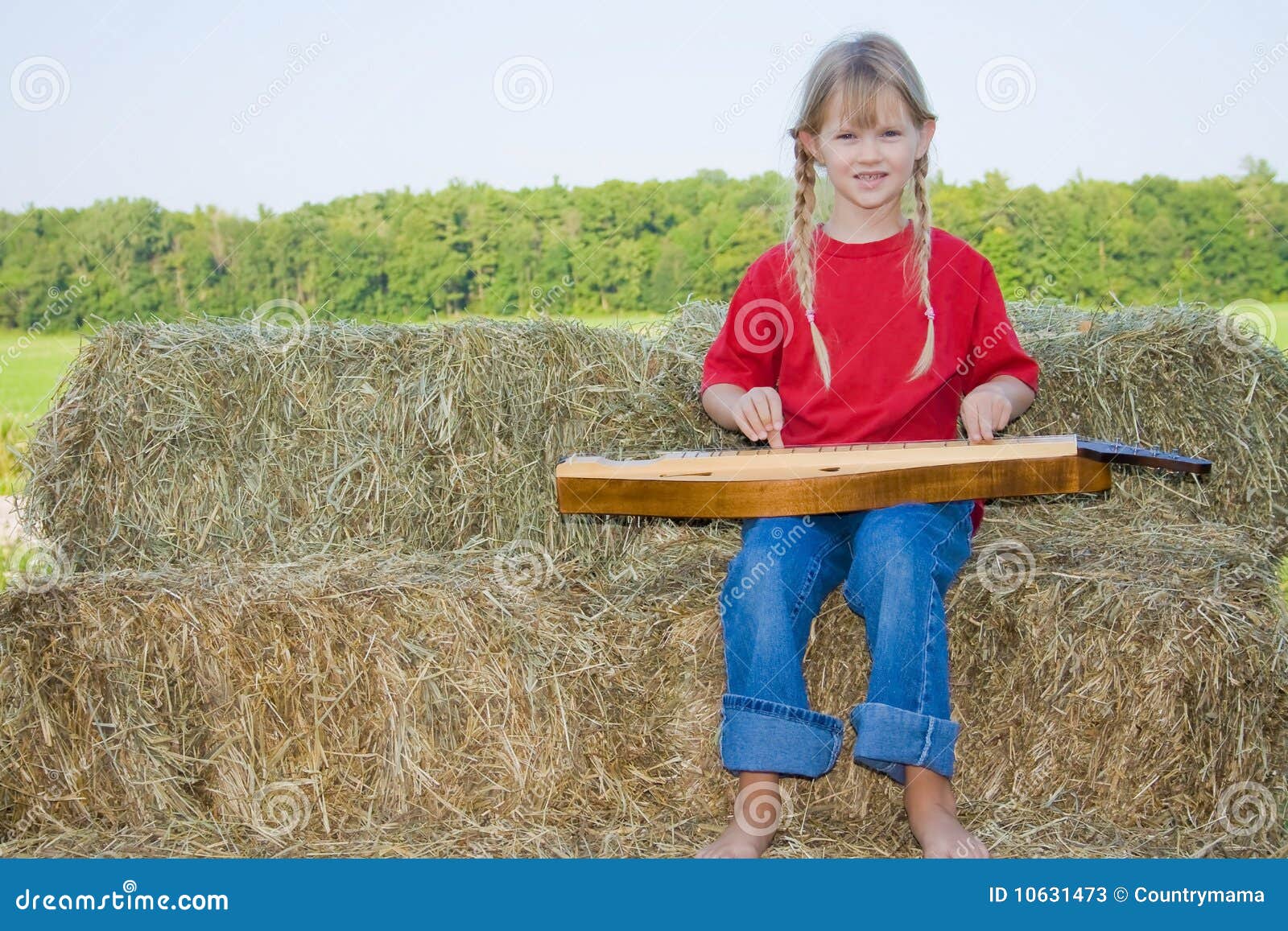Child playing instrument. stock image. Image of smiling - 10631473