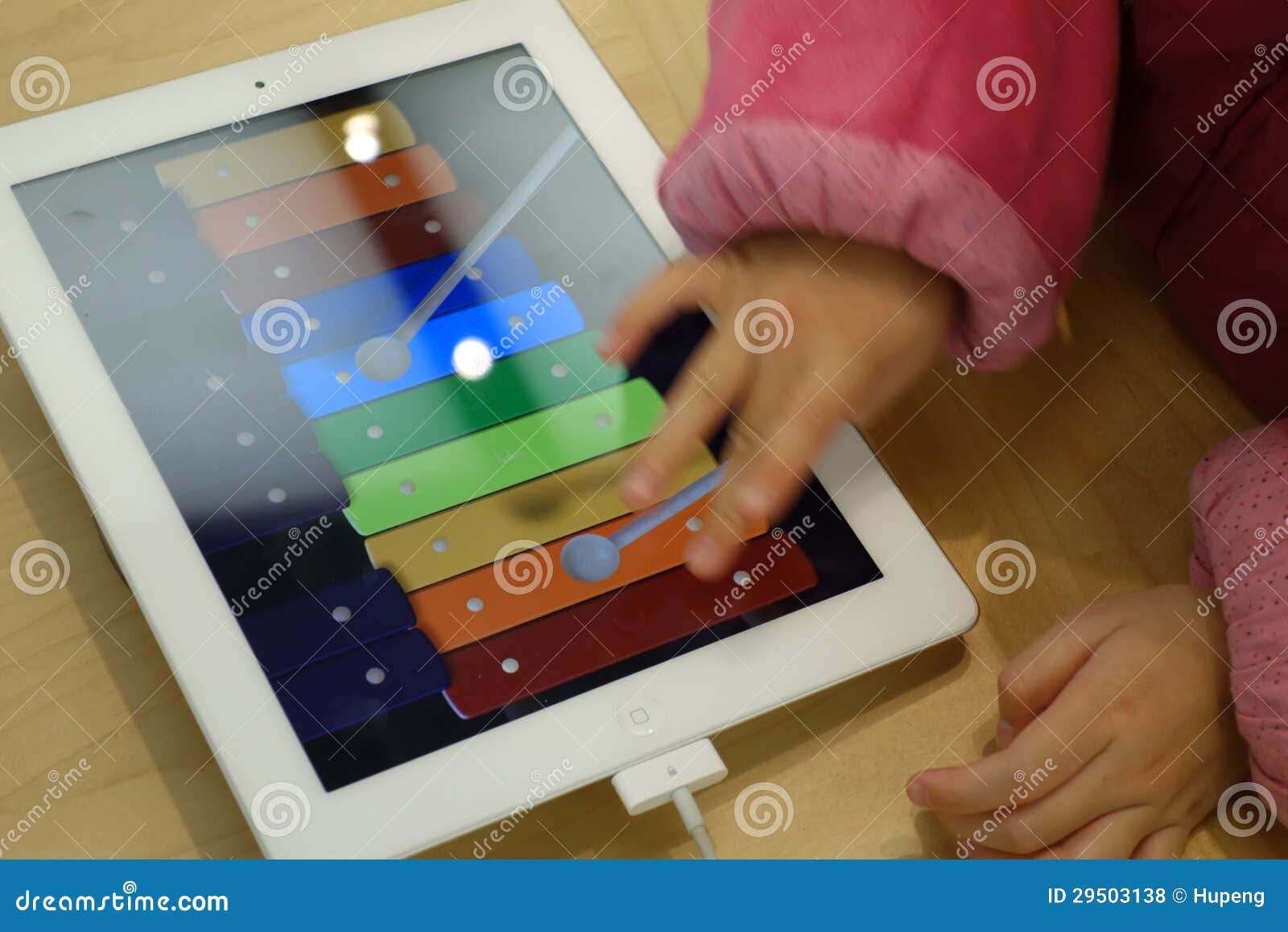 Child playing ipad editorial stock photo. Image of hand - 29503138