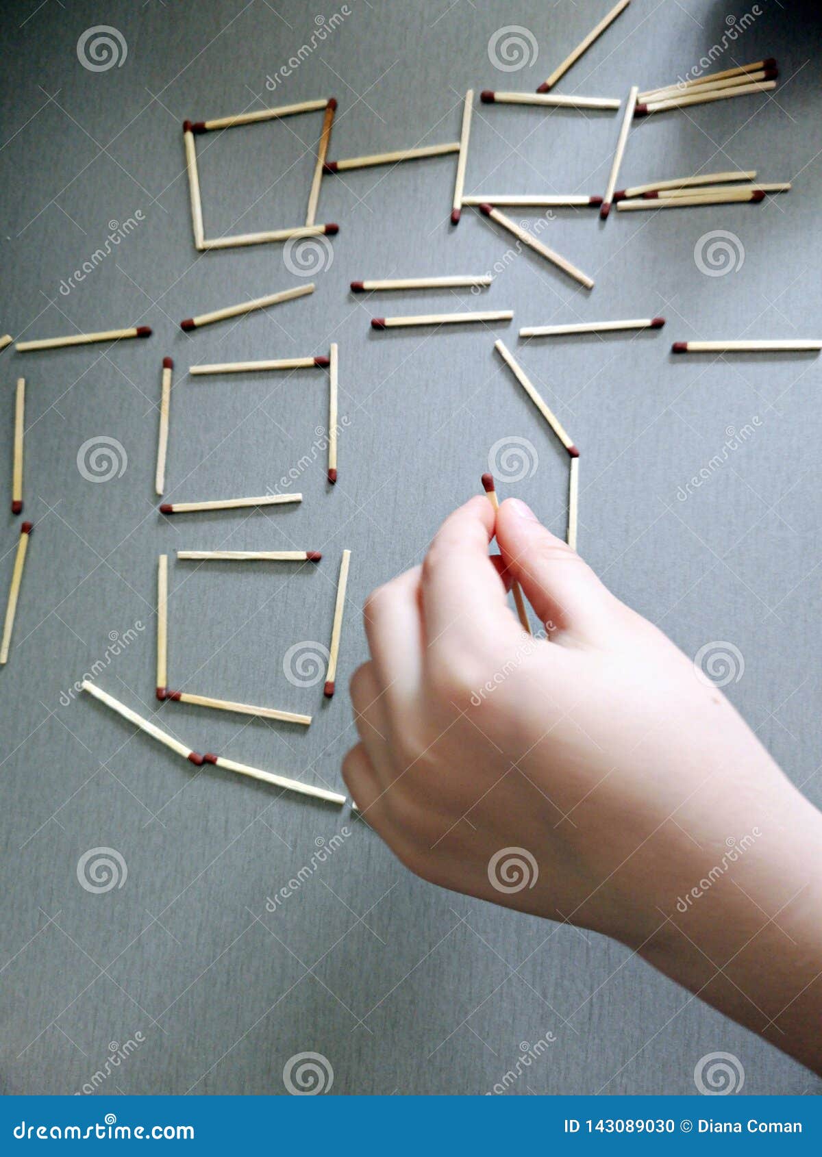 Child playing with matches stock photo. Image of board - 143089030