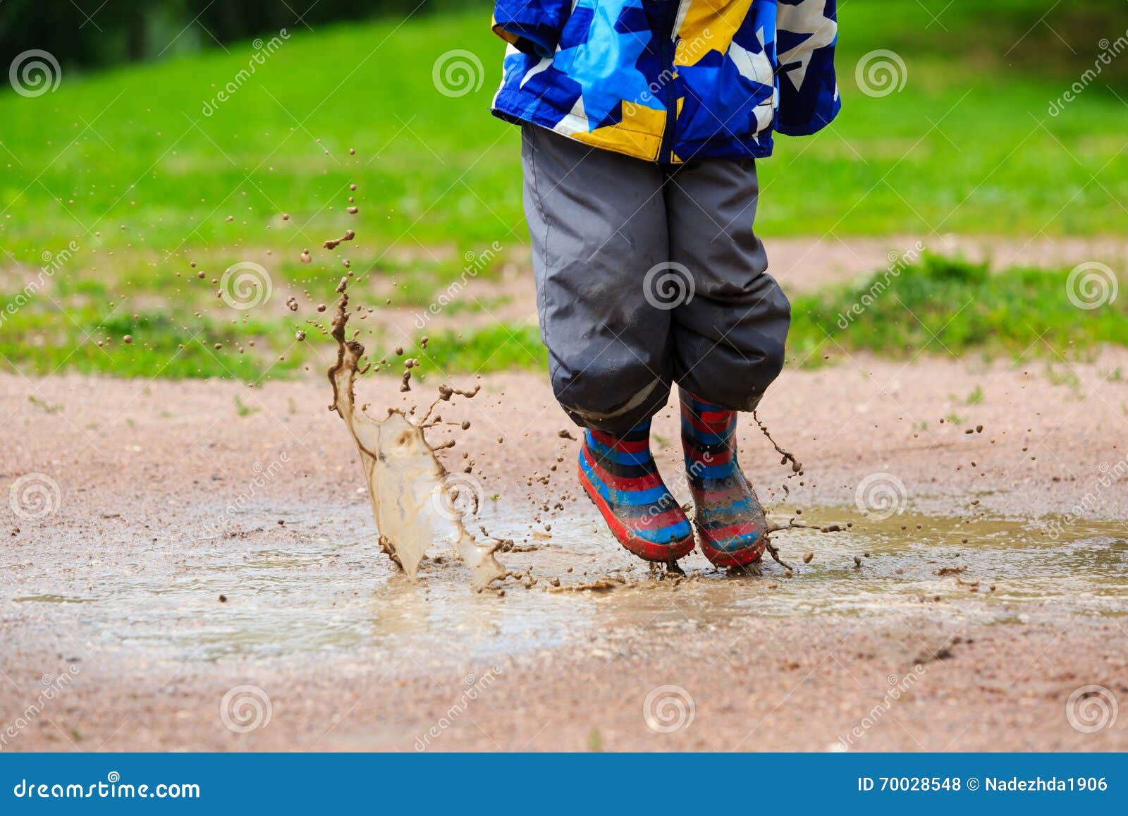 Child Playing in Muddy Puddle Stock Photo - Image of little, playtime ...
