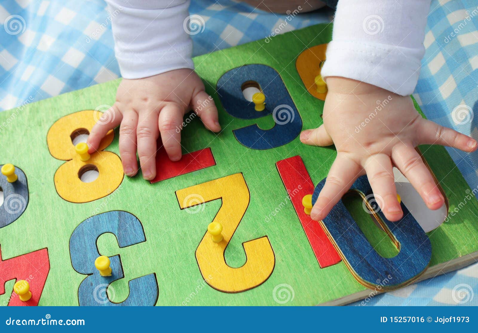 Child Playing with a Number Puzzle Stock Photo - Image of baby, hobbies ...
