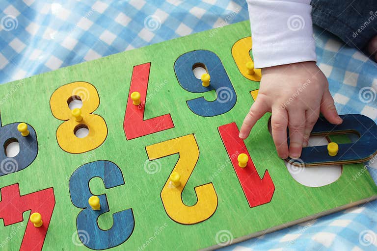 Child Playing with Number Puzzle Stock Photo - Image of knowledge, game ...