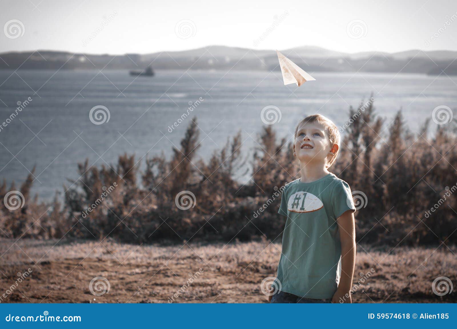Child Playing with Paper Airplane Stock Photo - Image of holiday ...