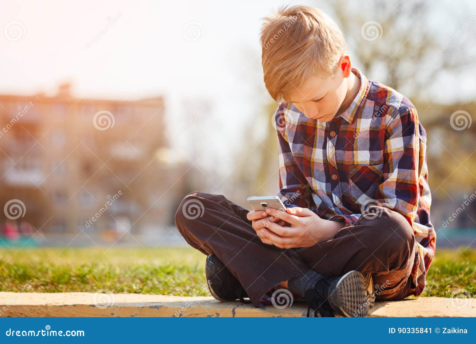 Child Playing Phone Outdoors in Sunny Day. Stock Image - Image of play ...
