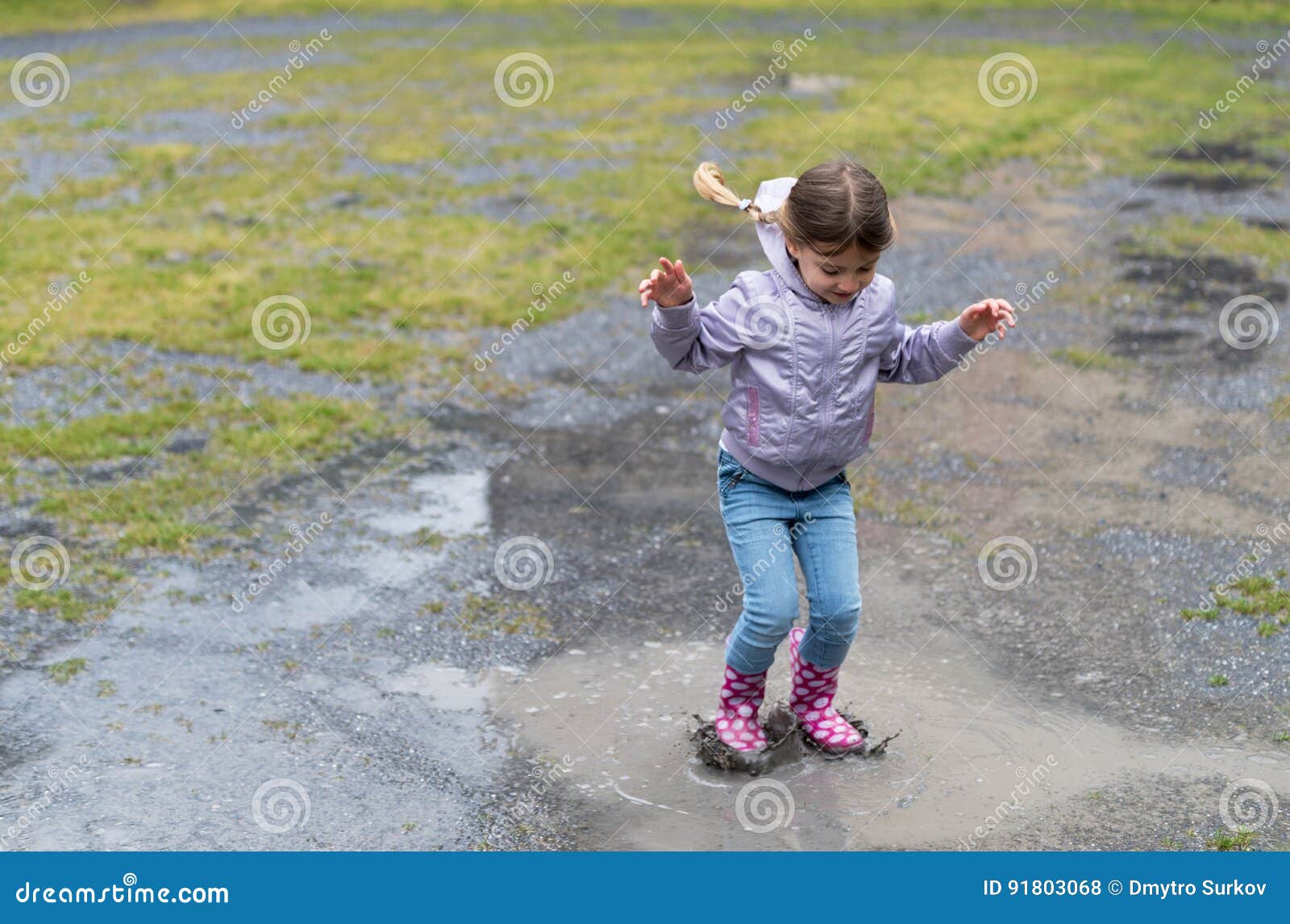 The Child Playing in a Puddle Stock Photo - Image of lifestyle, dirty ...