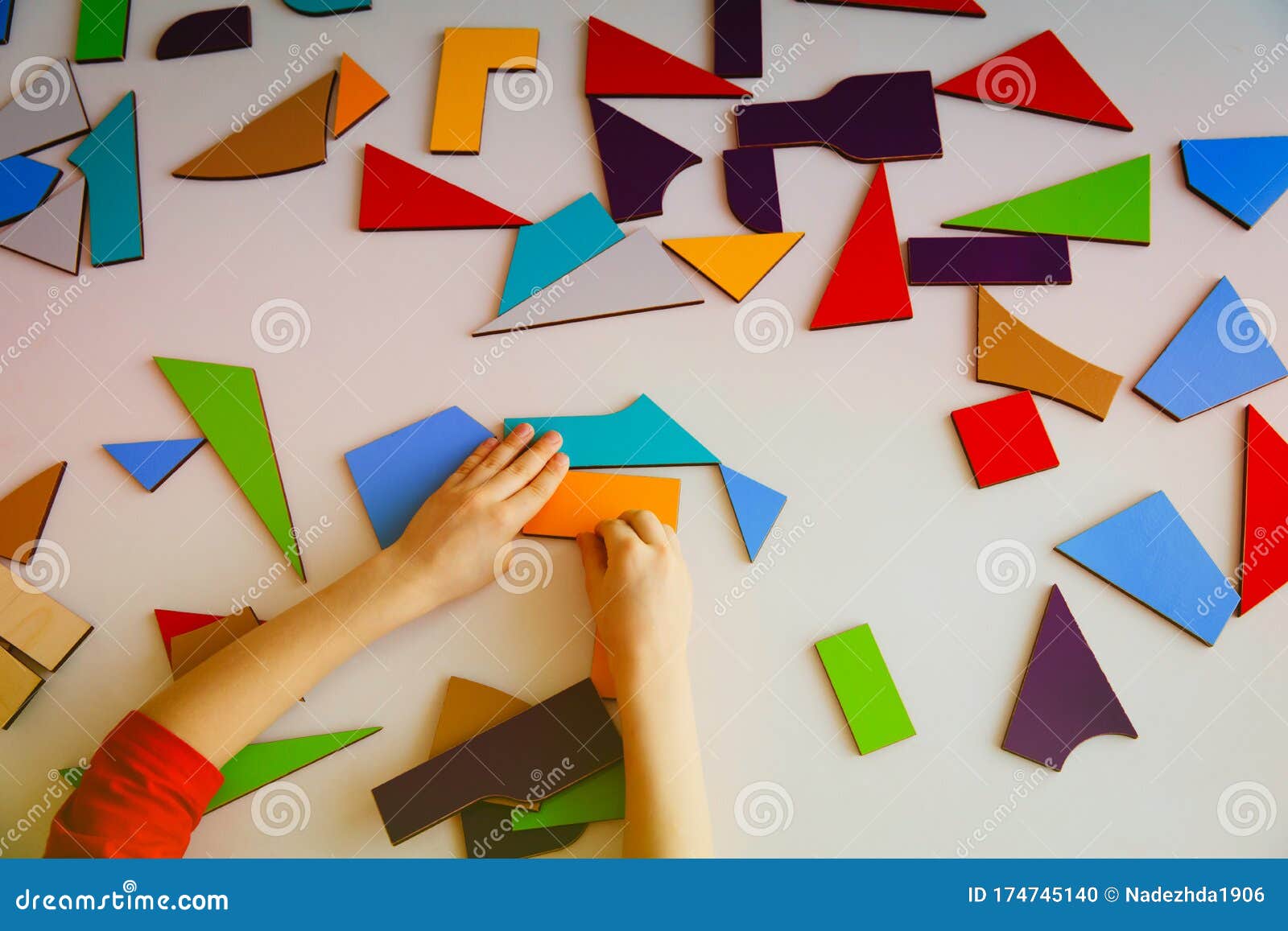 Child Playing with Puzzle or Tangram, Education Stock Photo - Image of ...