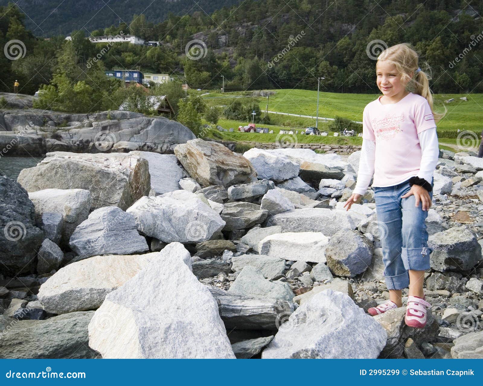Child playing on rocks stock image. Image of kiddie, outdoors - 2995299