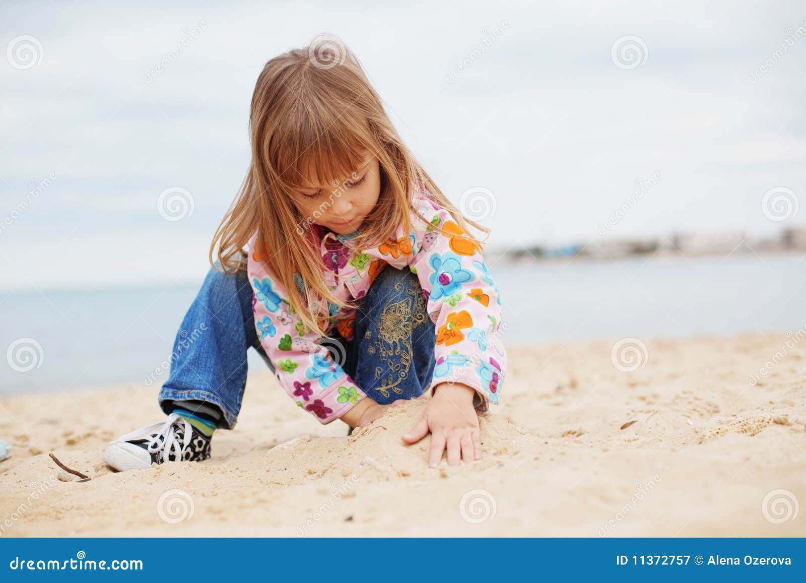 Child playing with sand stock image. Image of person - 11372757