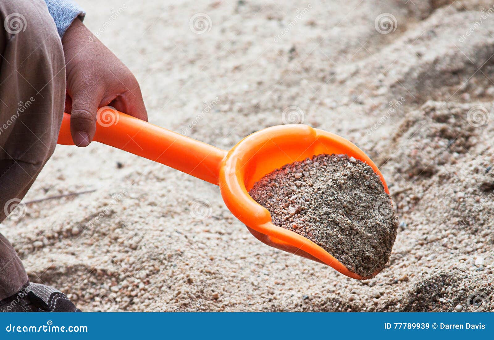 Child Playing in Sand with Orange Shovel Stock Image - Image of playing ...