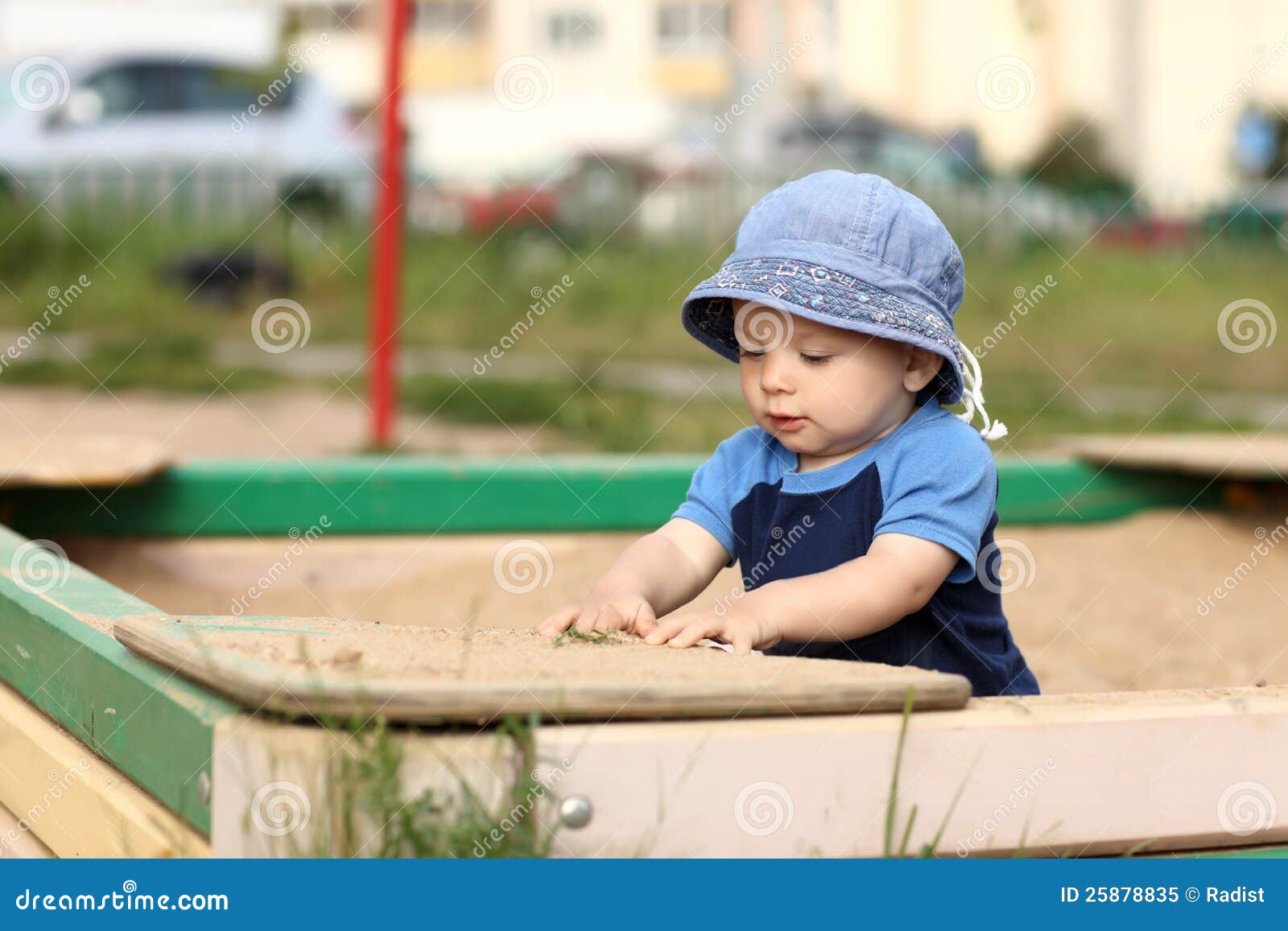 Child playing in sandbox stock image. Image of color - 25878835