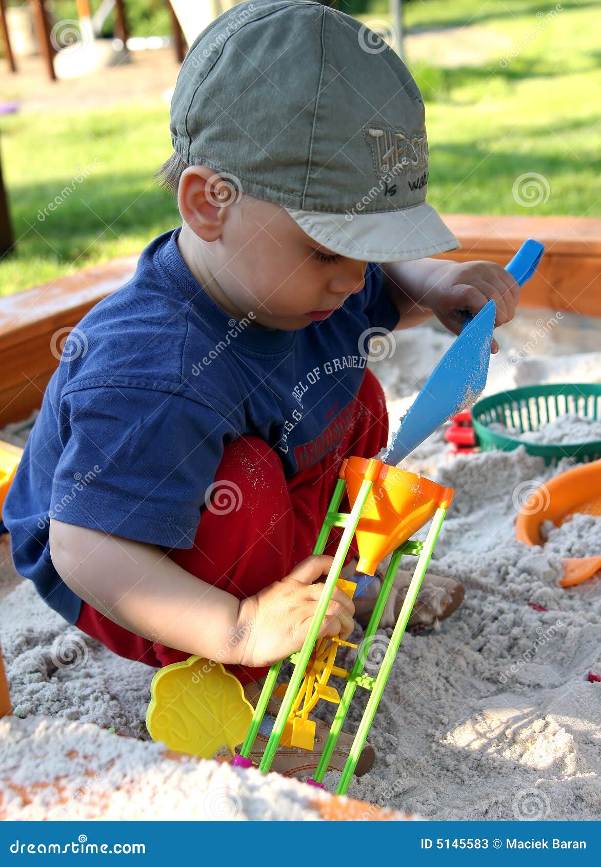 Child is Playing in Sandbox Stock Image - Image of outdoor, citypark ...