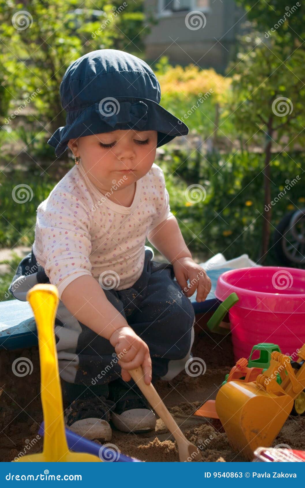 Child playing in sandbox stock image. Image of toddler - 9540863