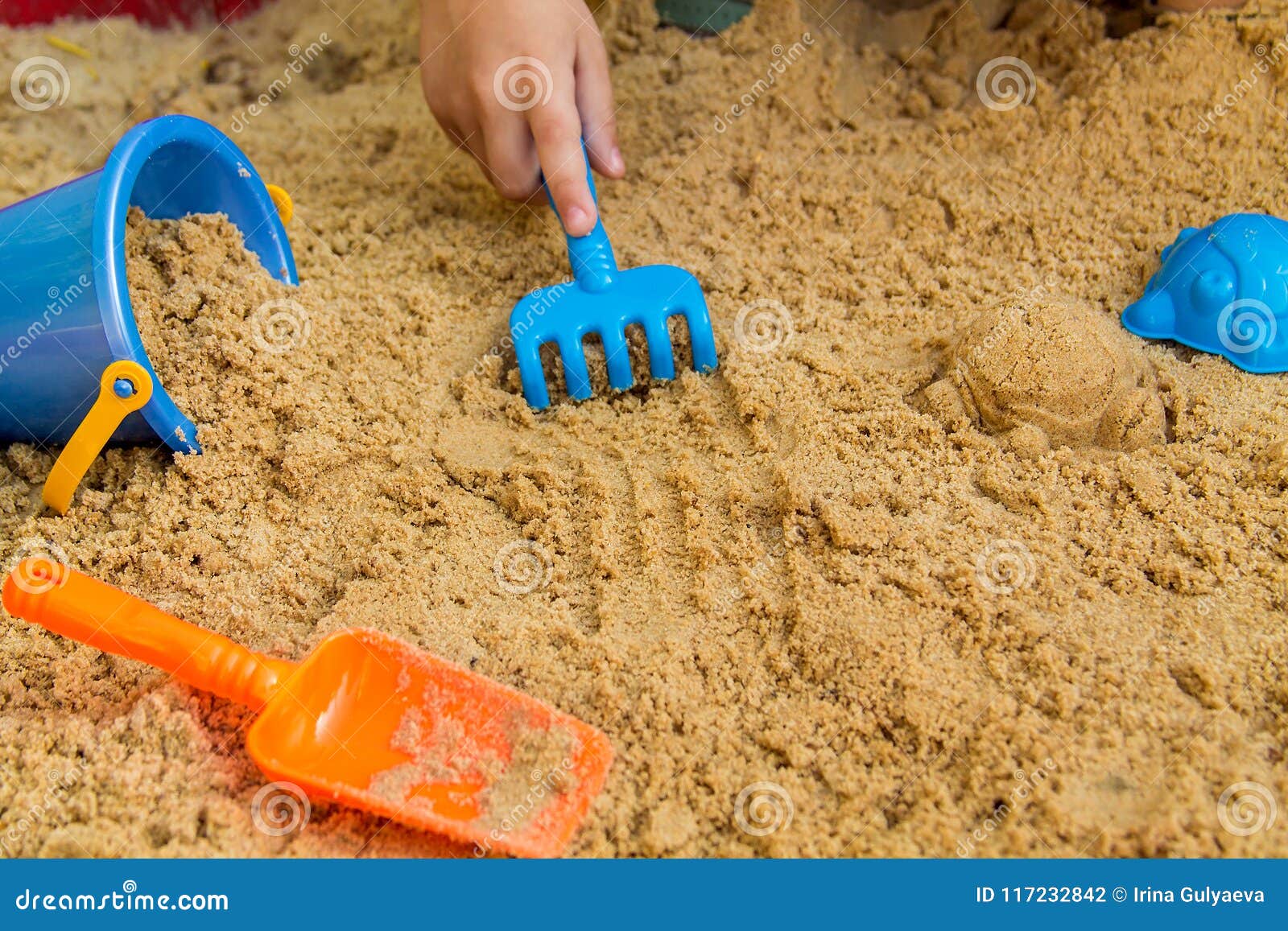 Child Playing in the Sandbox Stock Photo - Image of pour, concept ...