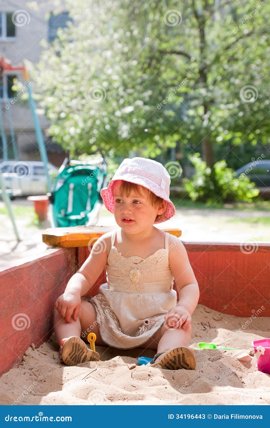 Child playing in sandbox stock image. Image of little - 34196443