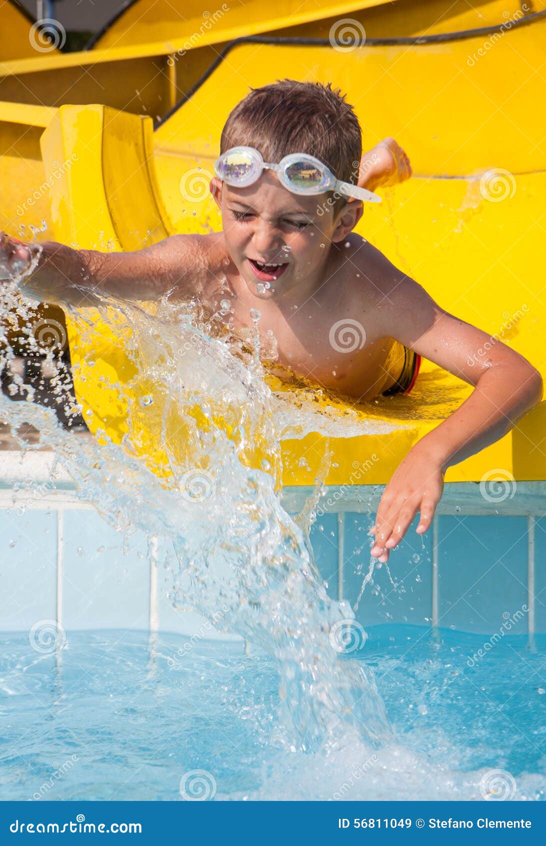 Child Playing with the Slide in the Pool Stock Image - Image of ...