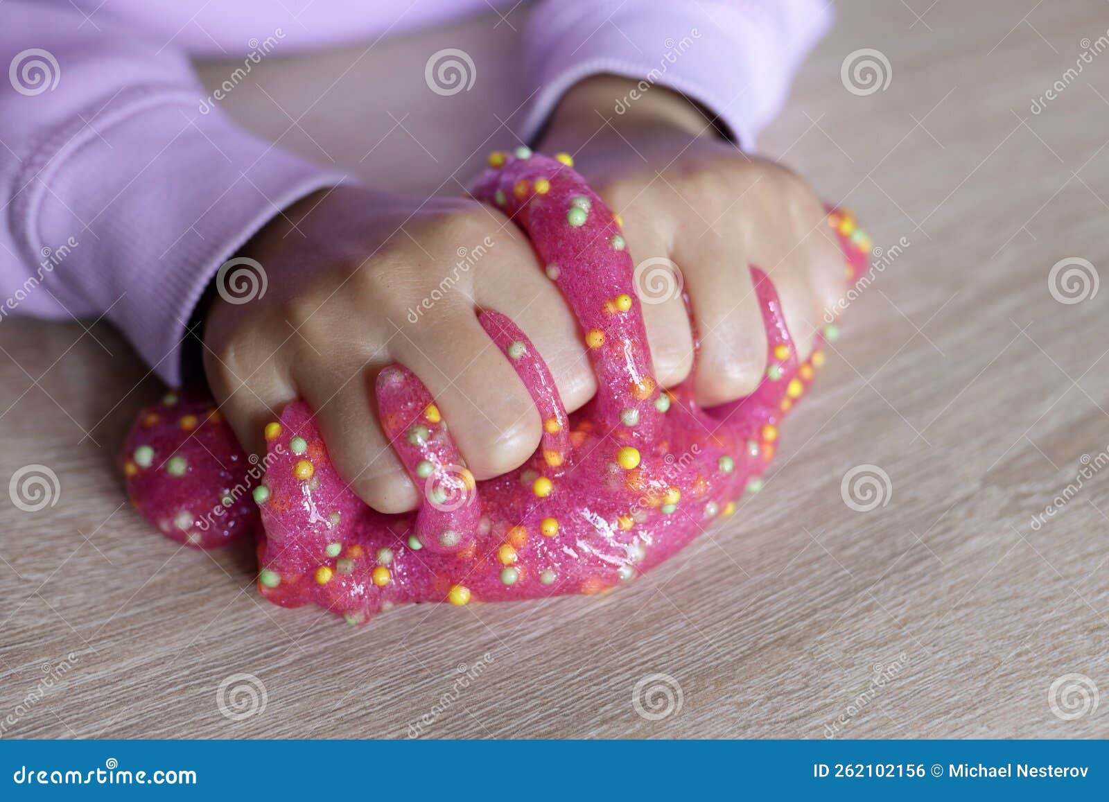 Child Playing with Slime on the Table Stock Photo - Image of hobby ...