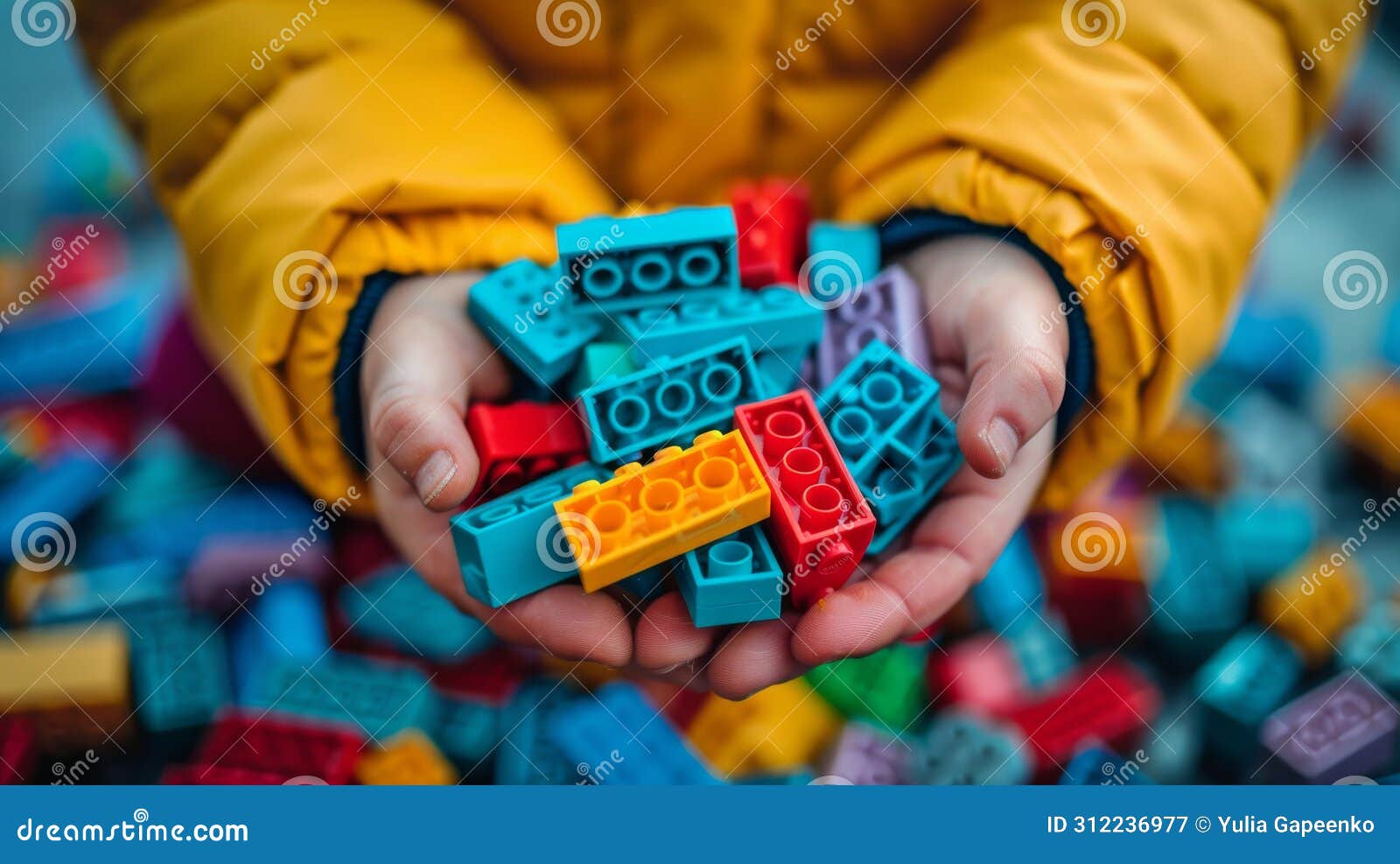 Child Playing with Stack of Legos Stock Image - Image of playful ...