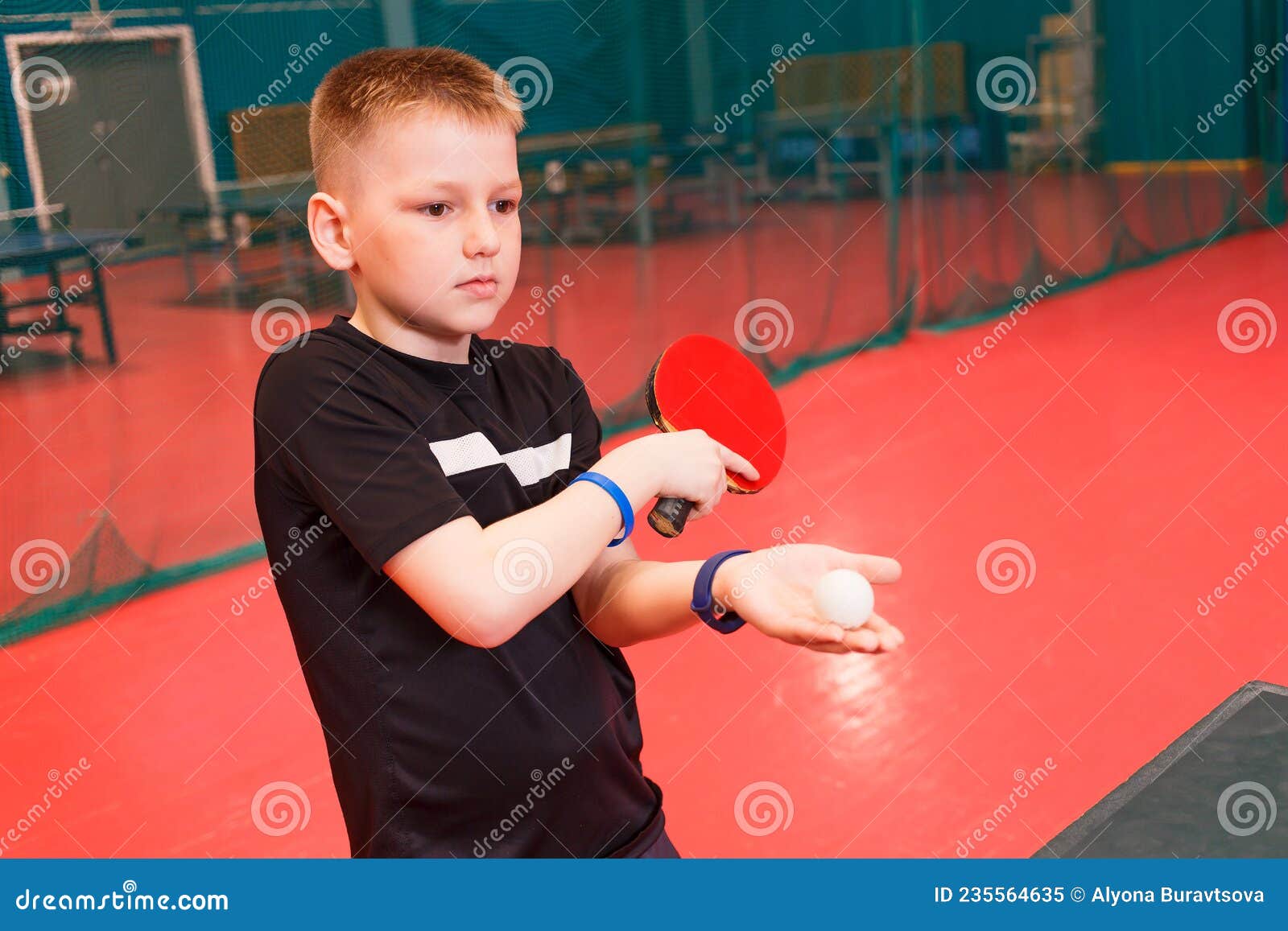 Child playing table tennis stock image. Image of expressive - 235564635