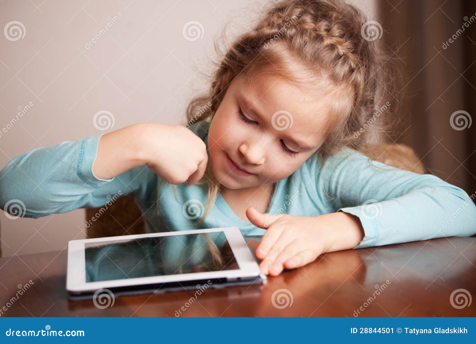 Child playing on tablet stock image. Image of leisure - 28844501