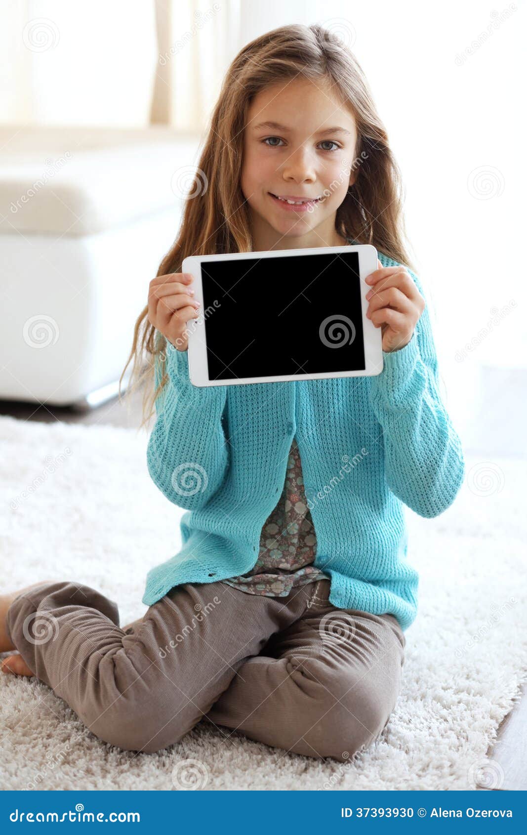 Child playing on tablet pc stock photo. Image of comfortable - 37393930