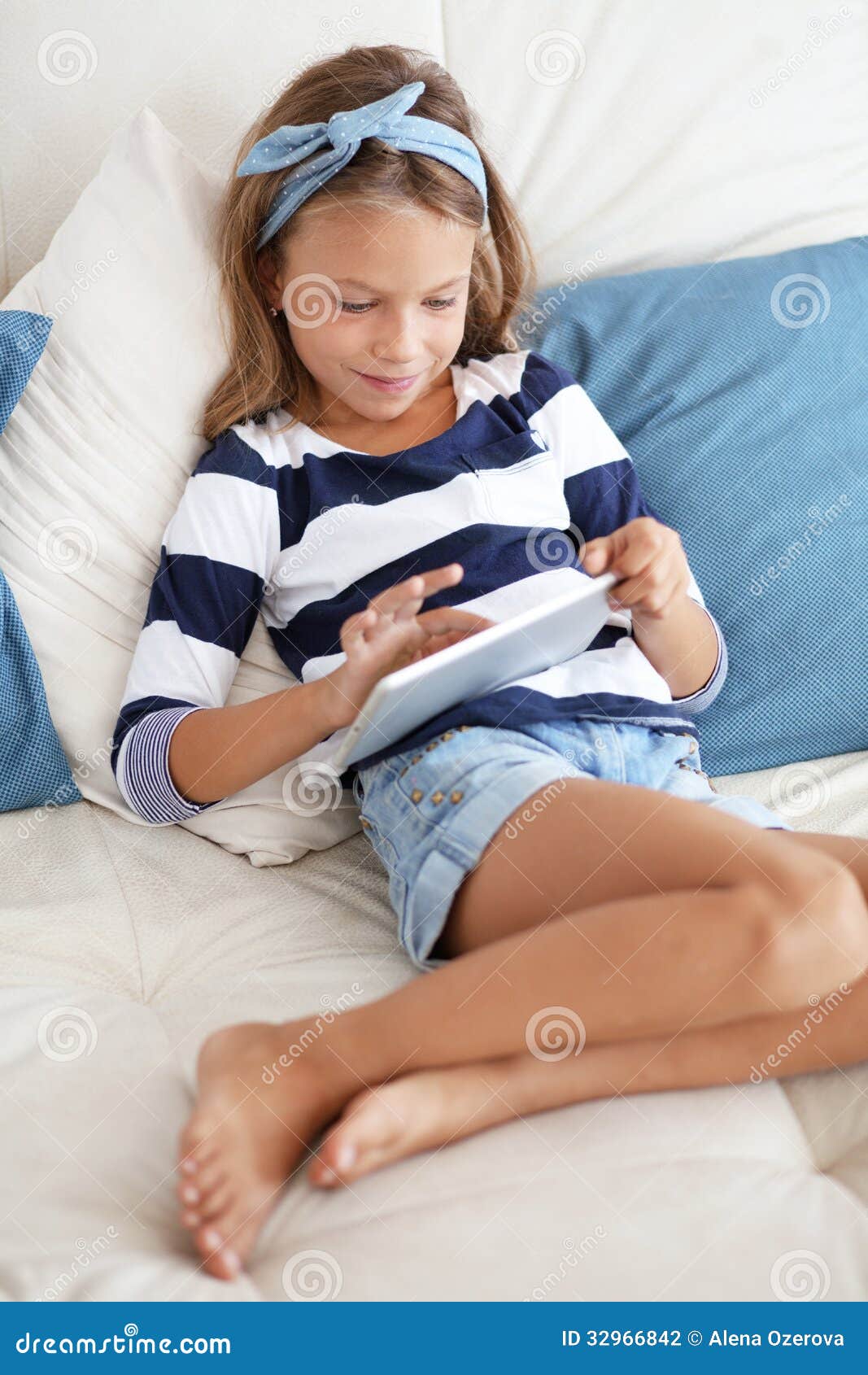 Child playing on tablet pc stock photo. Image of blue - 32966842