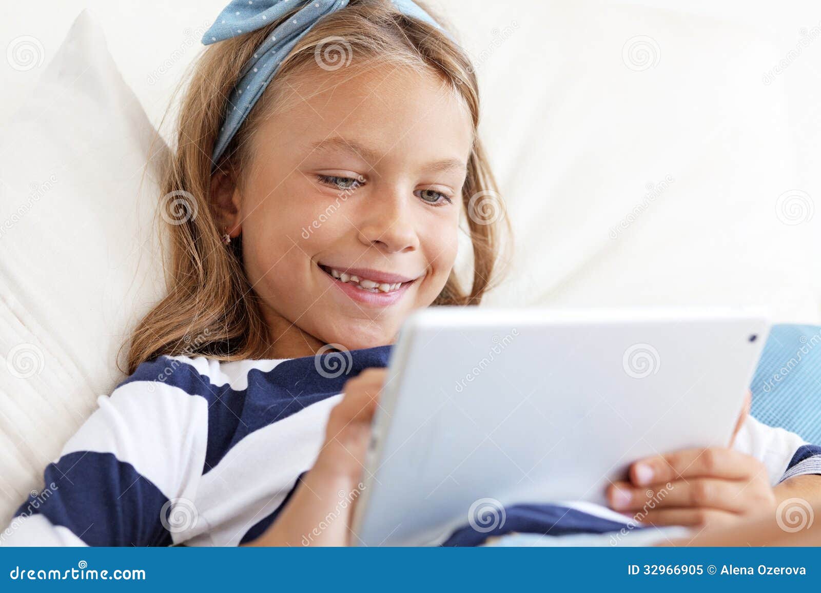 Child playing on tablet pc stock image. Image of human - 32966905