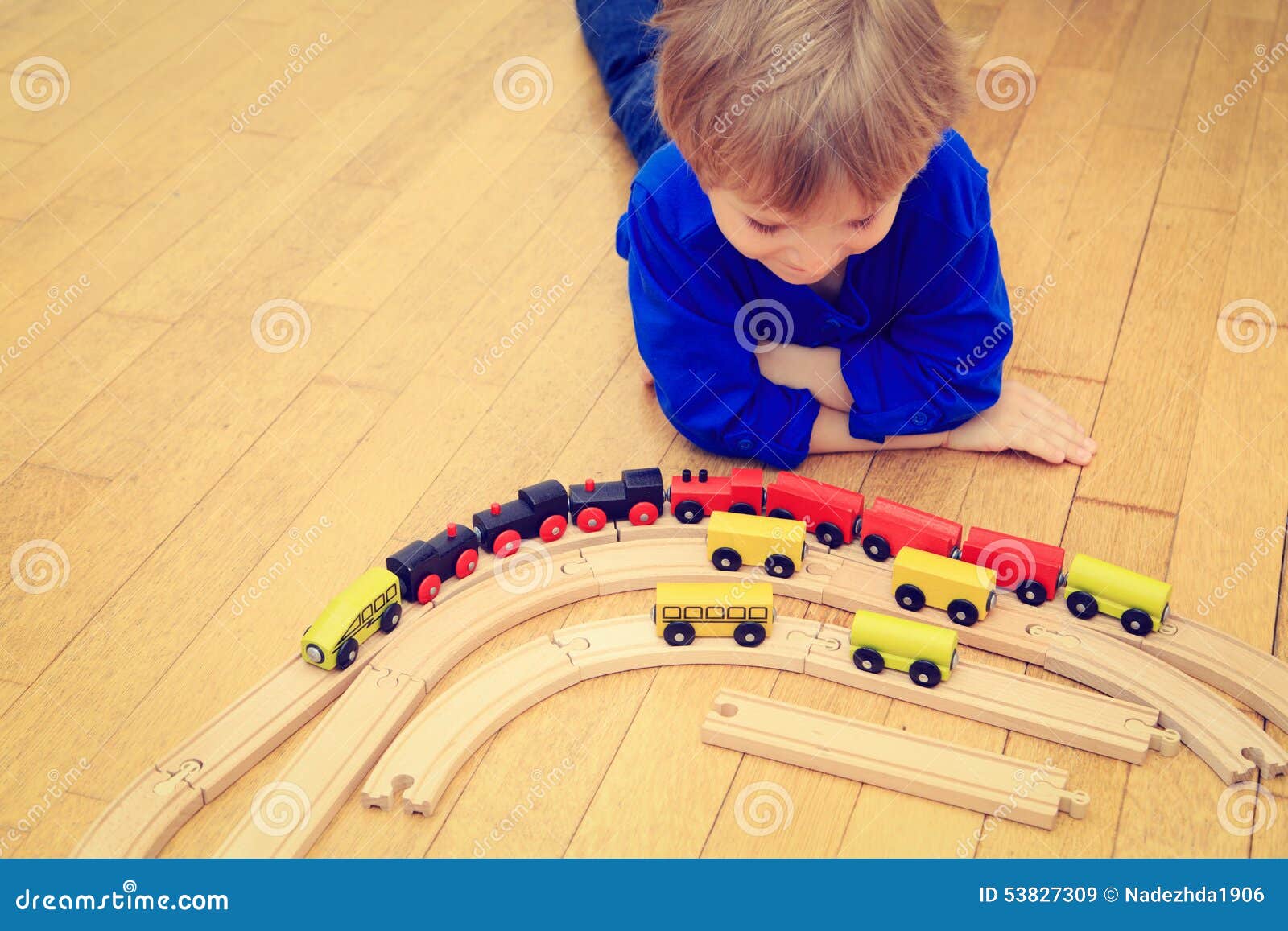 Child Playing with Trains Indoor Stock Image - Image of build ...