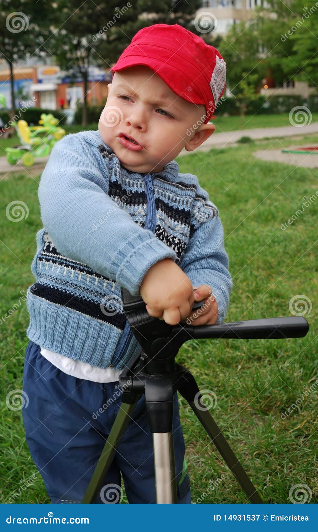 Child playing with tripod stock image. Image of human - 14931537