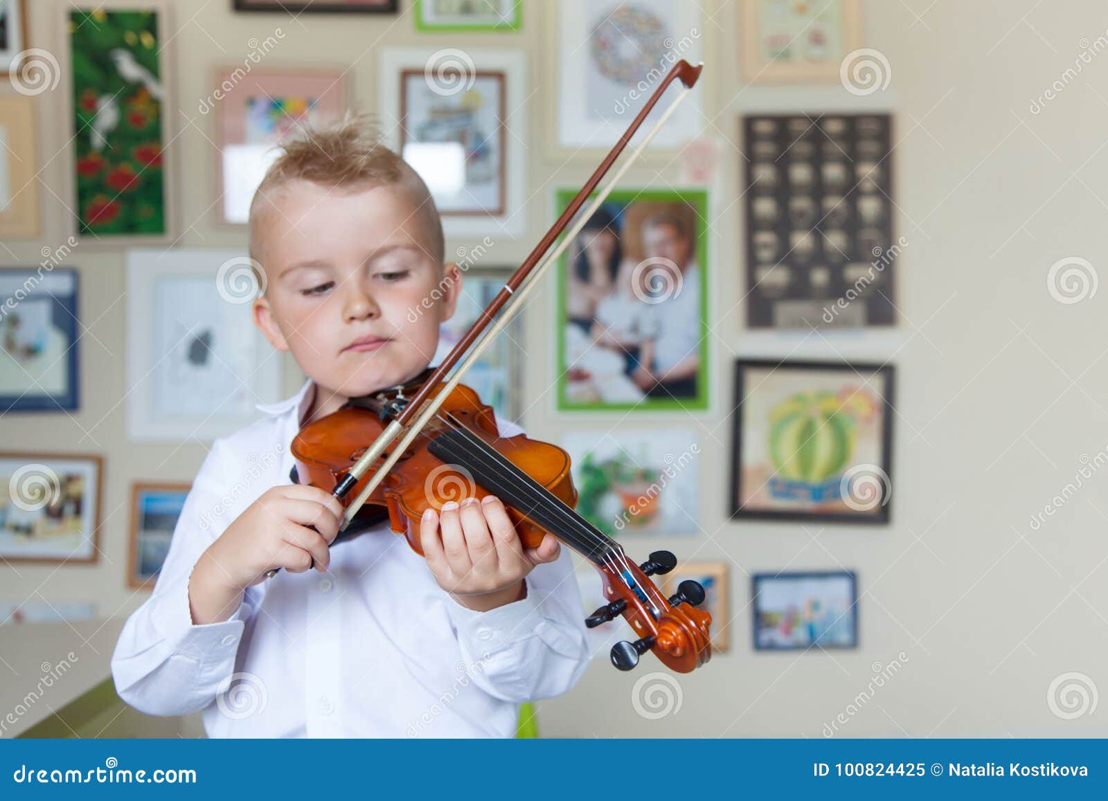 The Child is Playing the Violin. Boy Studying Music Stock Image - Image ...