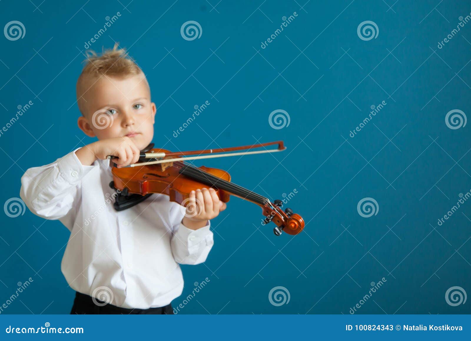 The Child is Playing the Violin. Boy Studying Music. Stock Image ...
