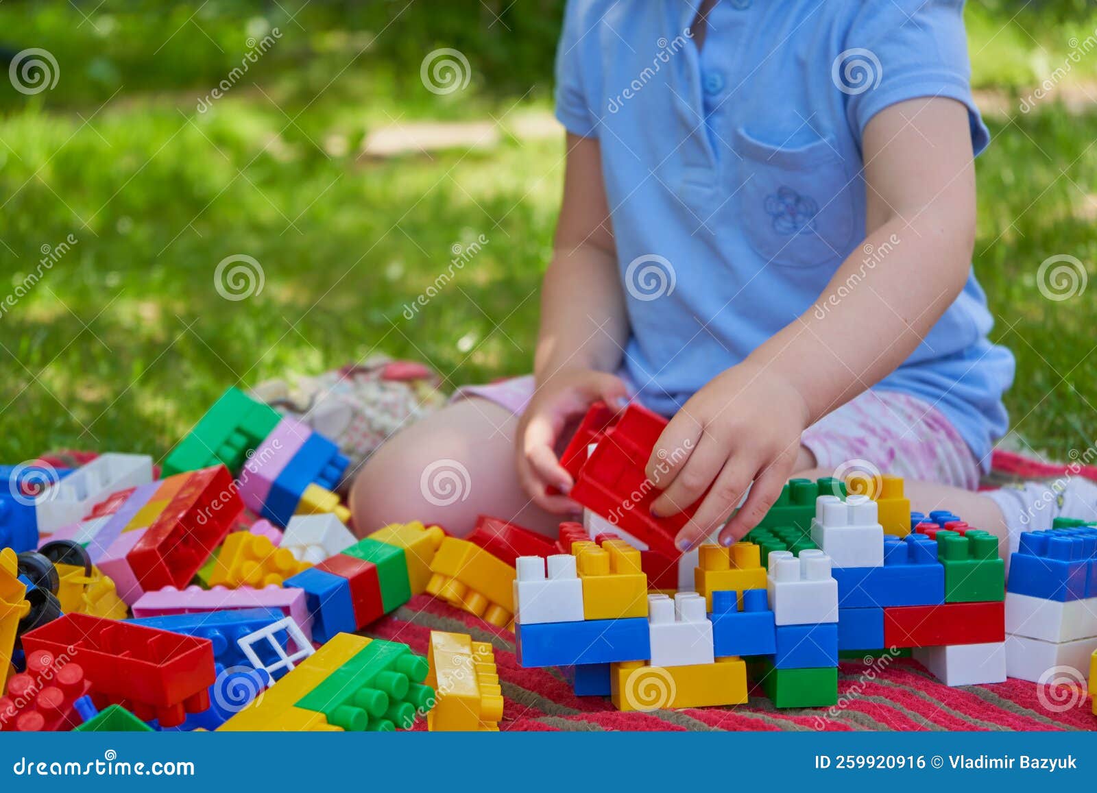 Child Plays with Colored Blocks,a Child and Toys, a Child Builds a ...