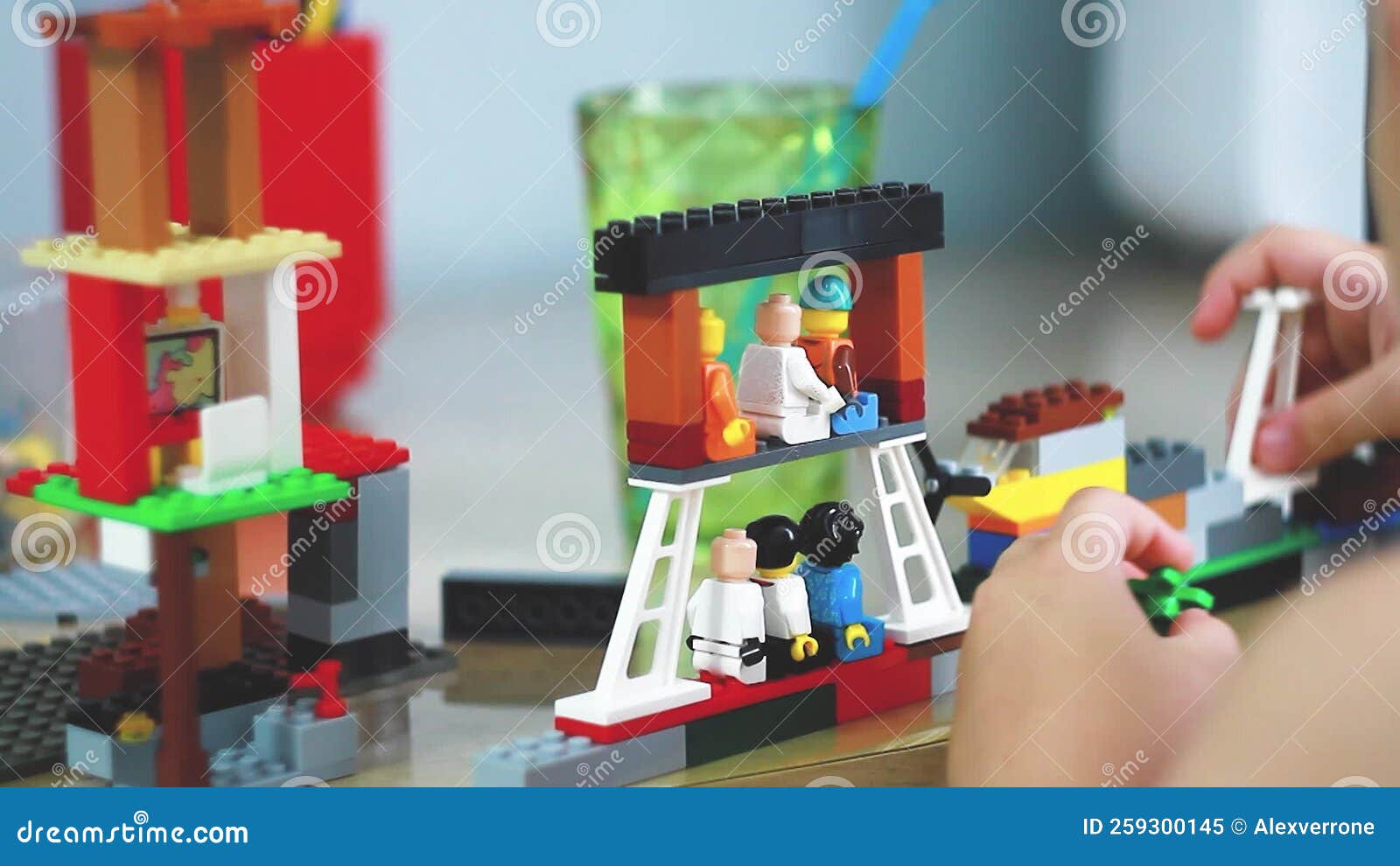 Child Plays with Constructor. Little Boy Builds Figures from Cubes of ...