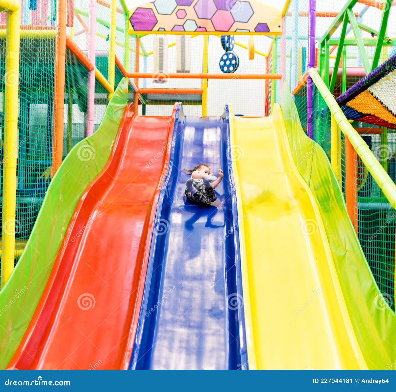 Child Plays Fun in the Entertainment Center. Game Center Stock Image ...