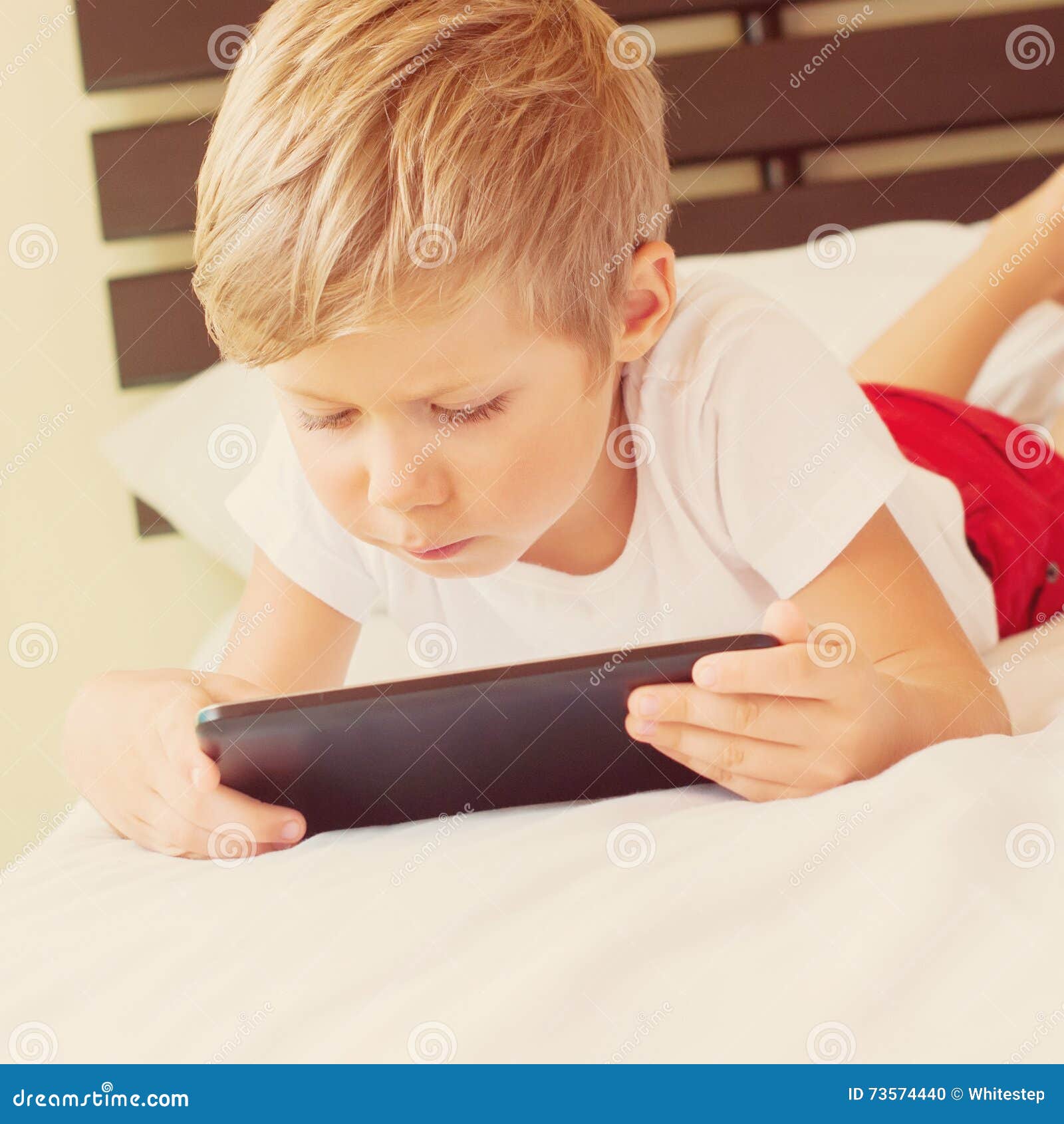 Child Plays Games on Tablet. Modern Technologies Stock Photo - Image of ...
