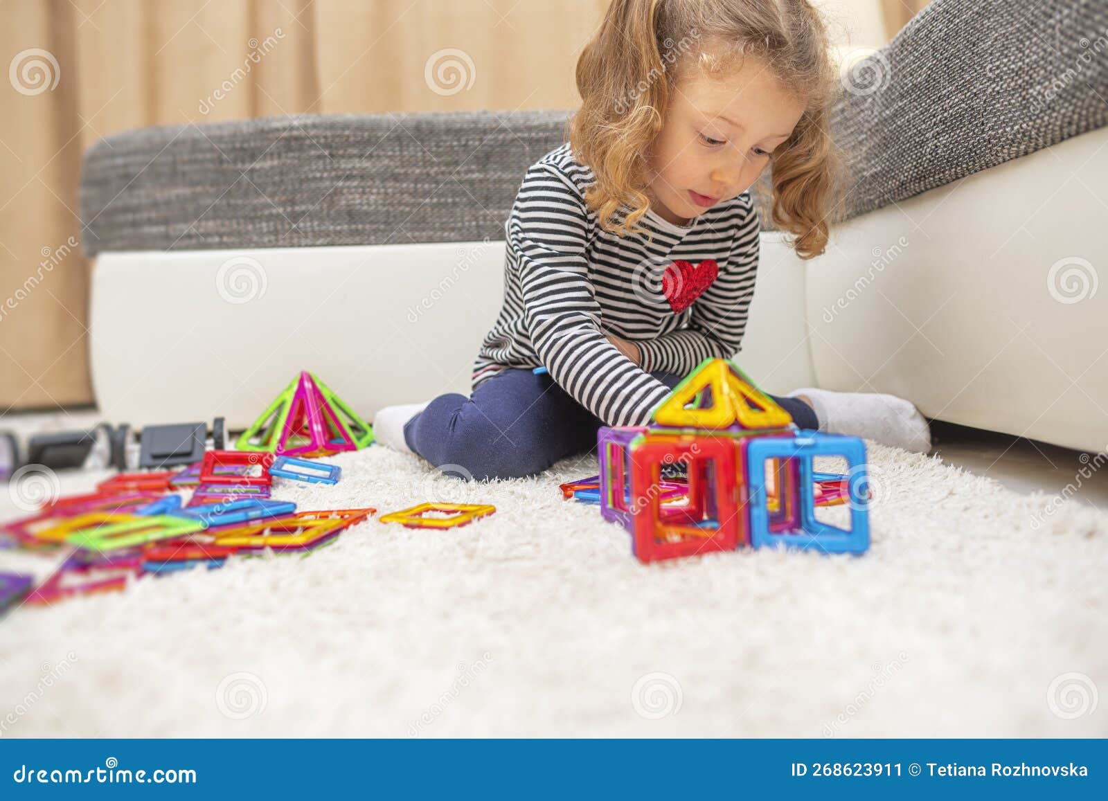 Child Plays with a Magnetic Construction Set. Stock Image - Image of ...