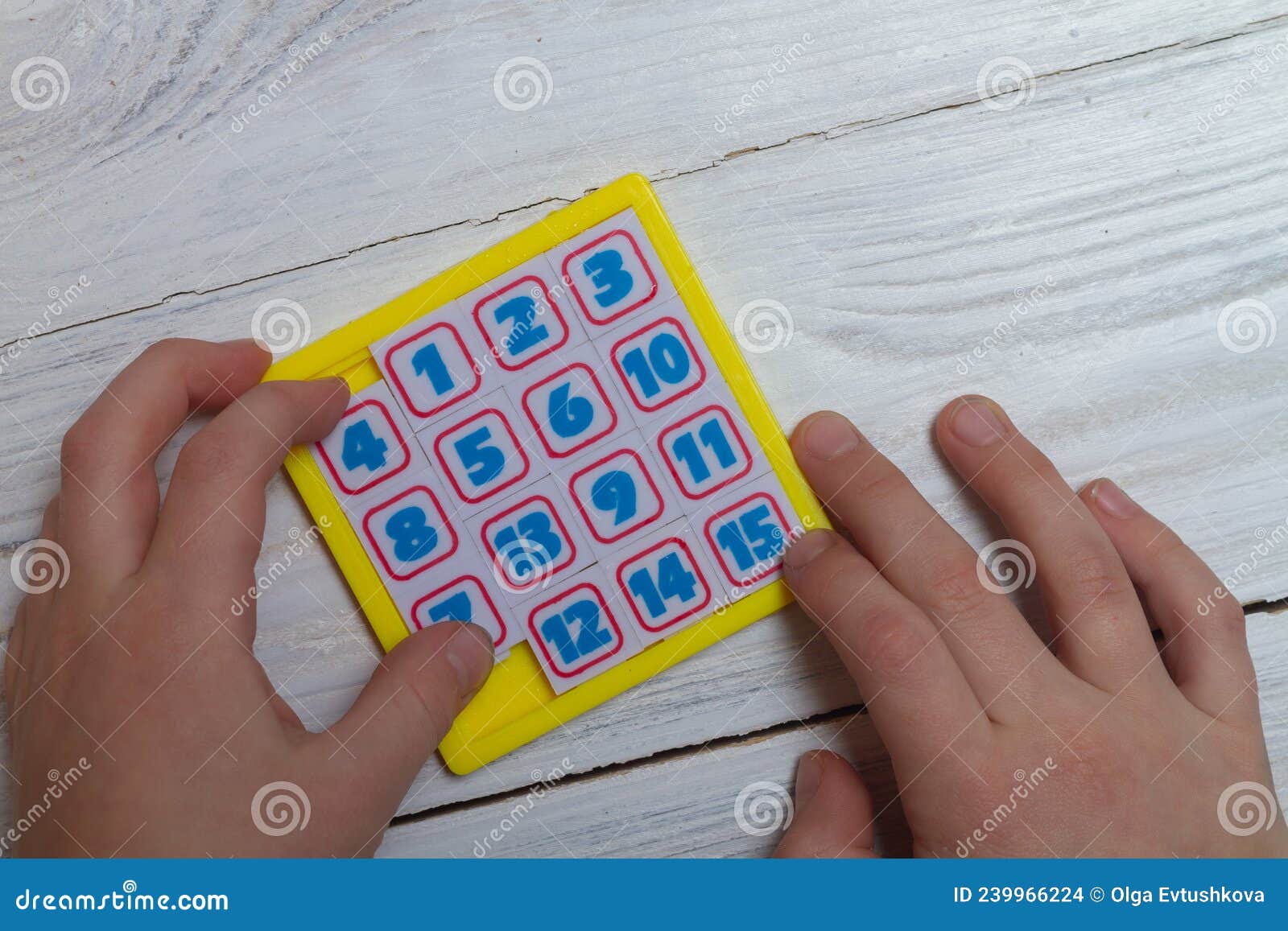 The Child Plays a Math Game with Numbers Tag, Puts the Numbers in the ...